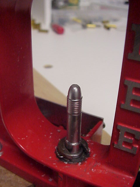 Here's the bullet after a full stroke of the press handle. The nose of ...
